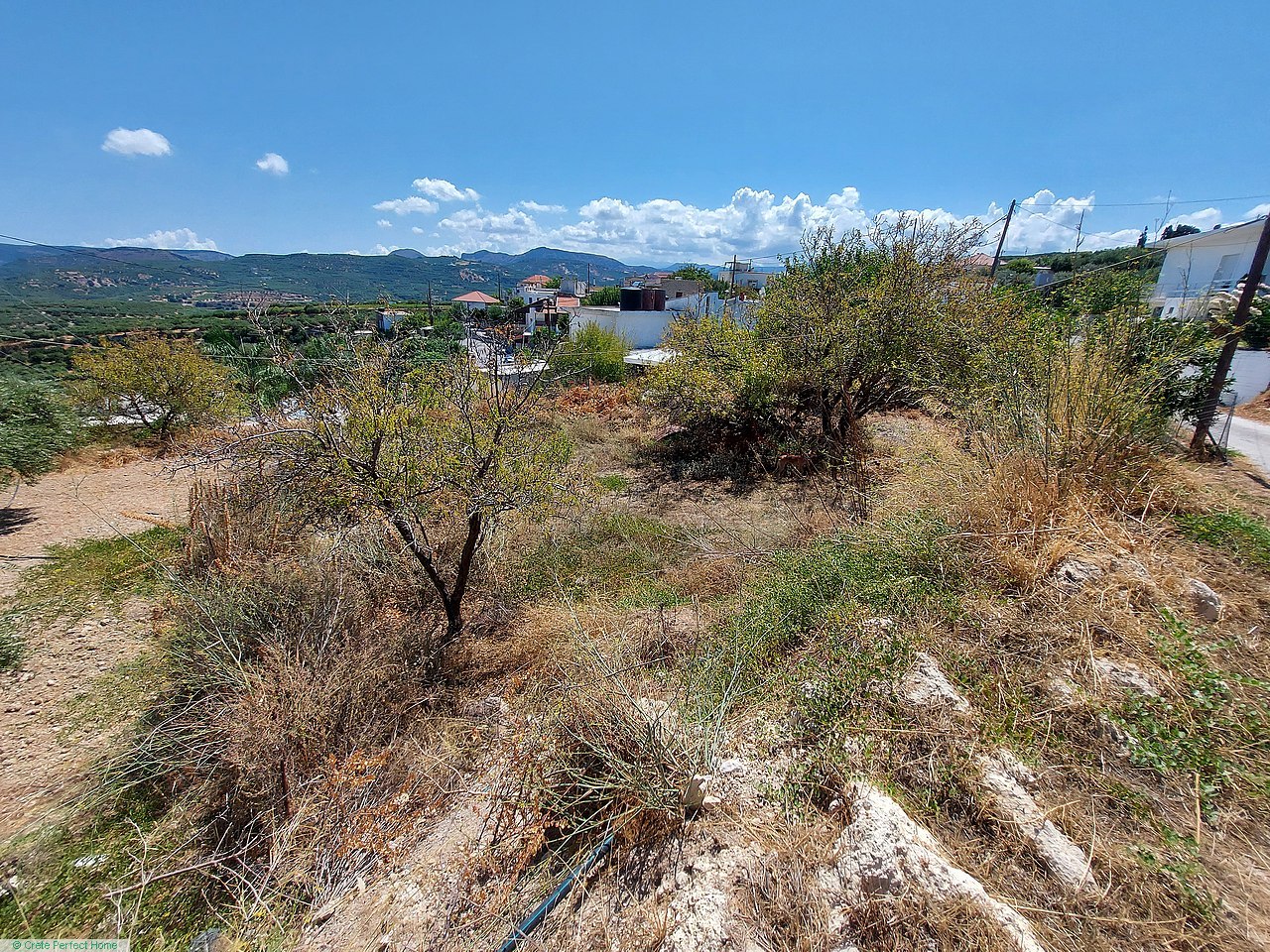 Small raised village plot, close to beaches, nice sea and rural views ...